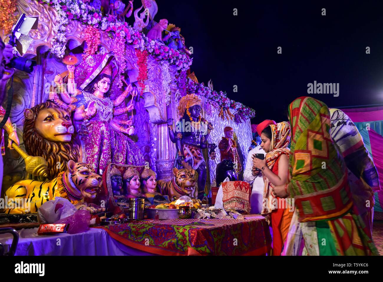 Devotees seen praying during the ritual. Jagran is a Hindu ritual ...