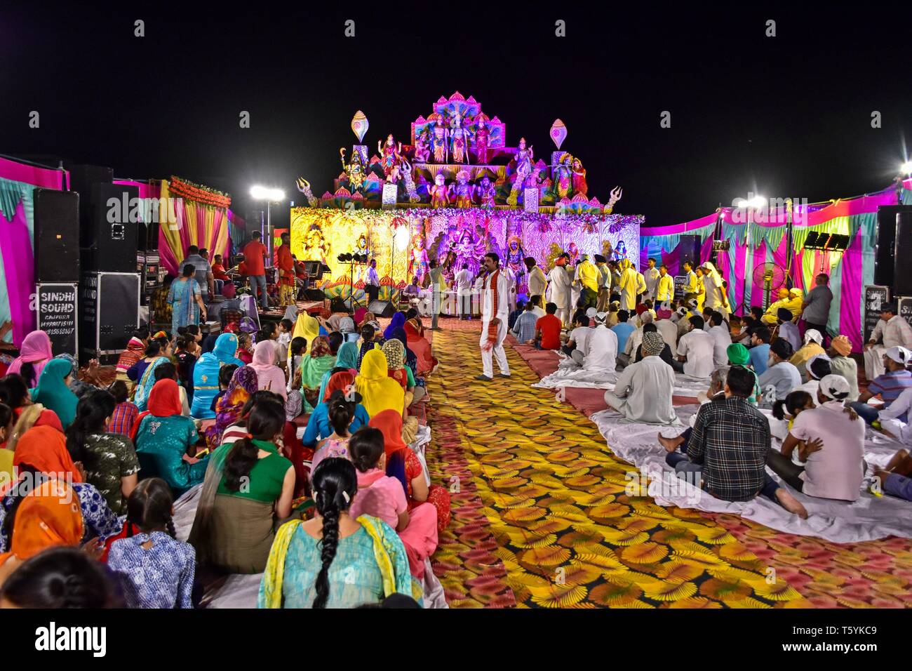 Devotees seen praying during the ritual. Jagran is a Hindu ritual ...