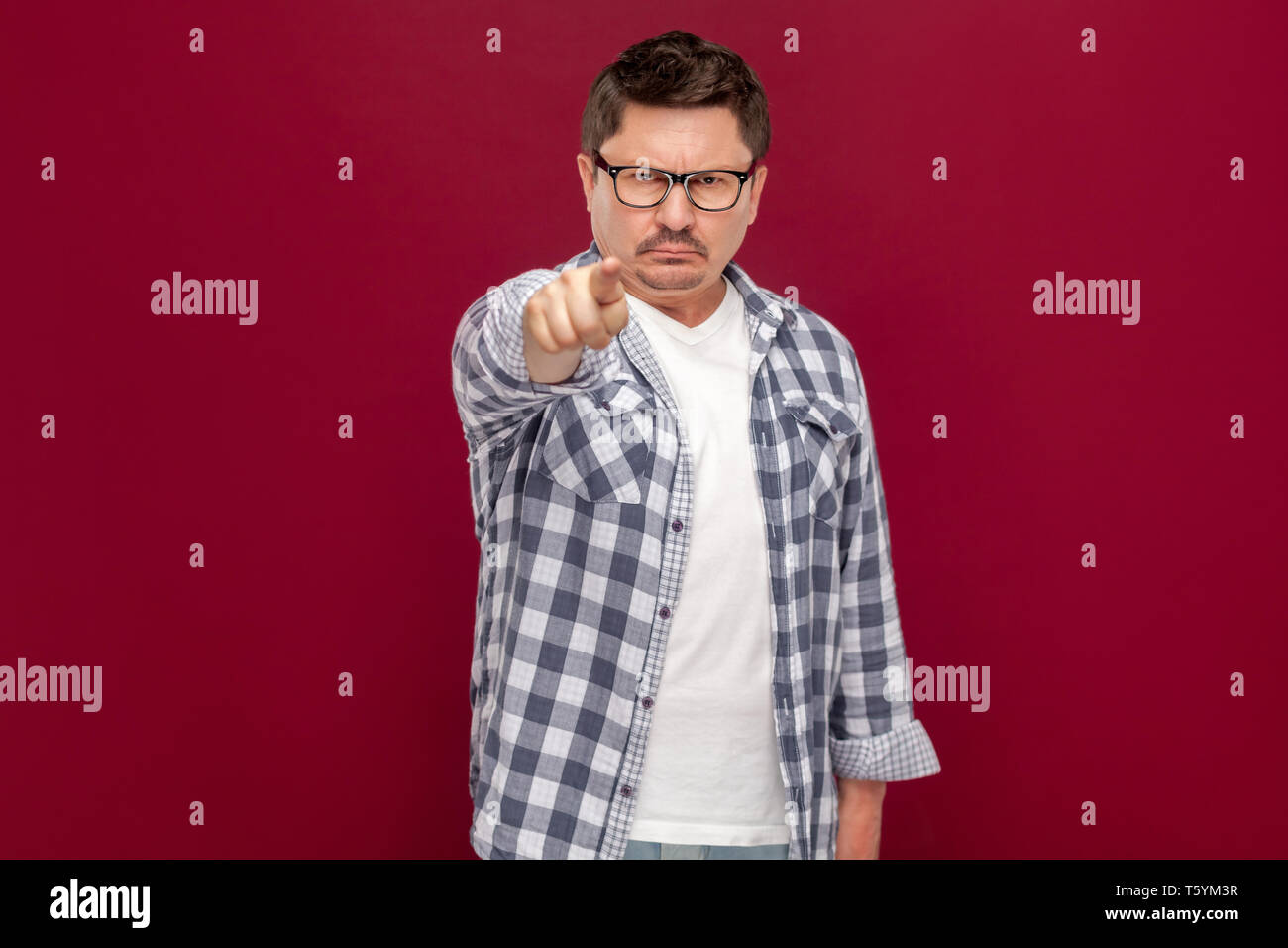 Angry caucasian businessman scolding camera hi-res stock photography ...
