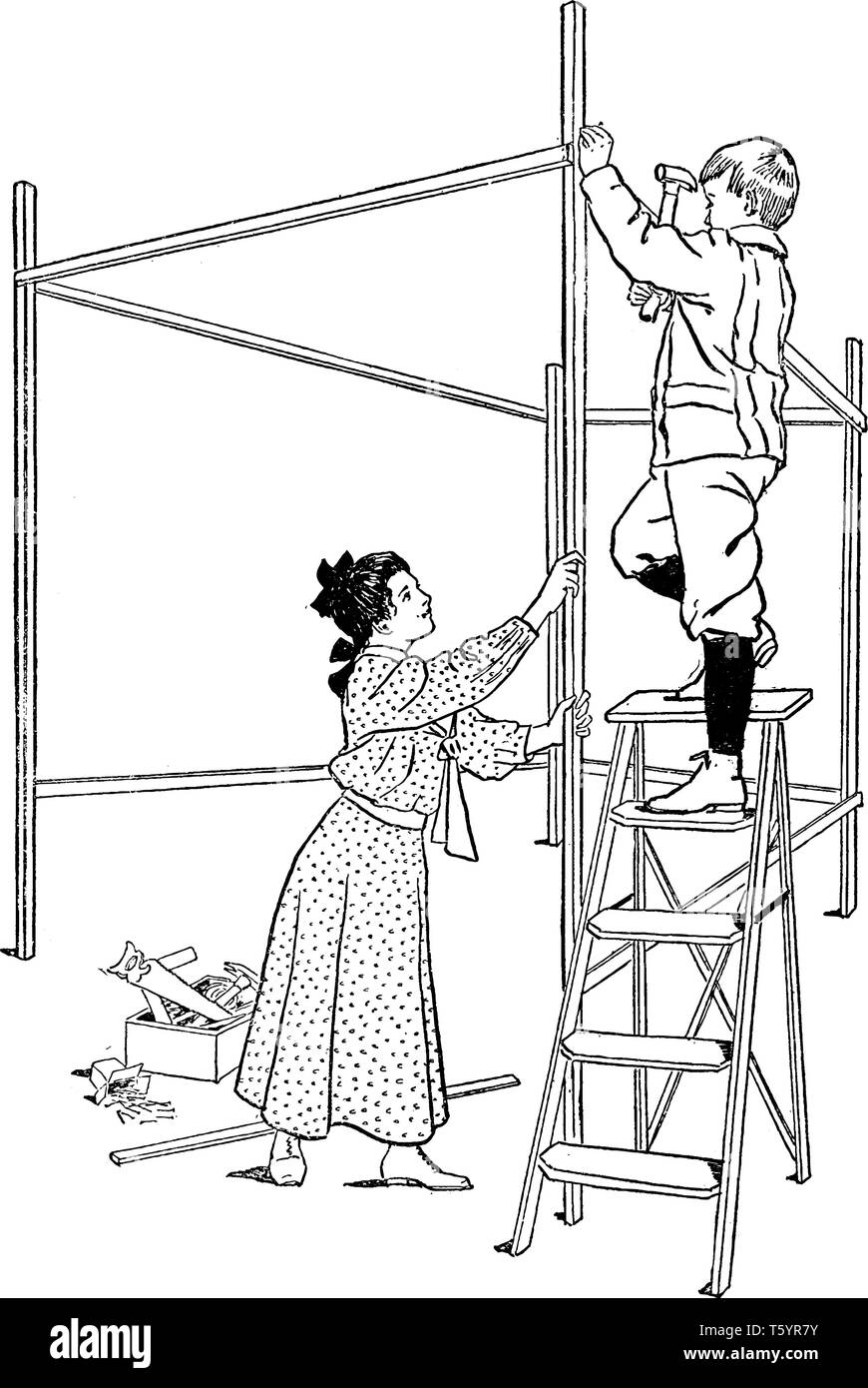 A little boy and woman setting up the framework of a booth, vintage ...