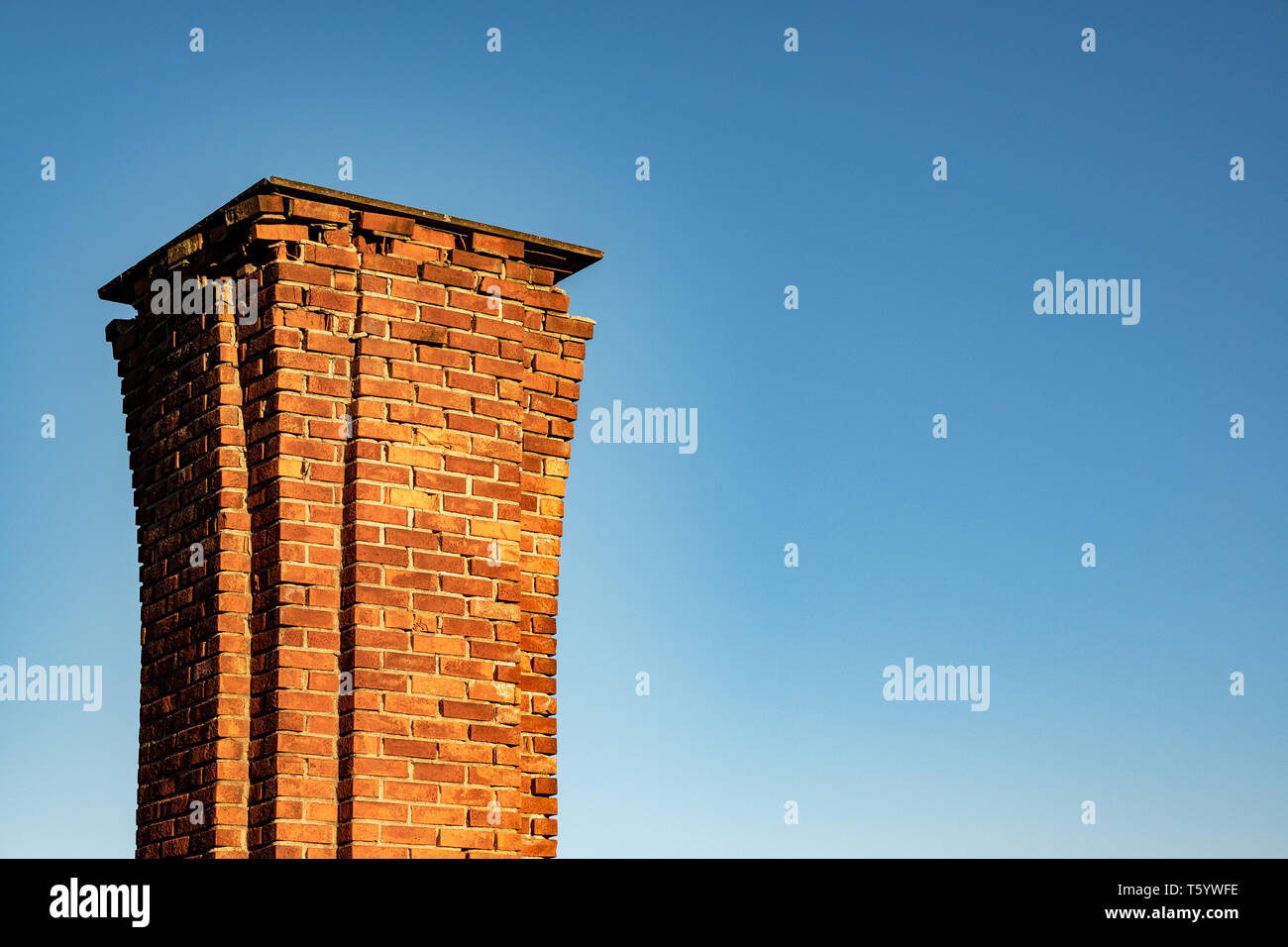 Old chimney standing alone Stock Photo - Alamy