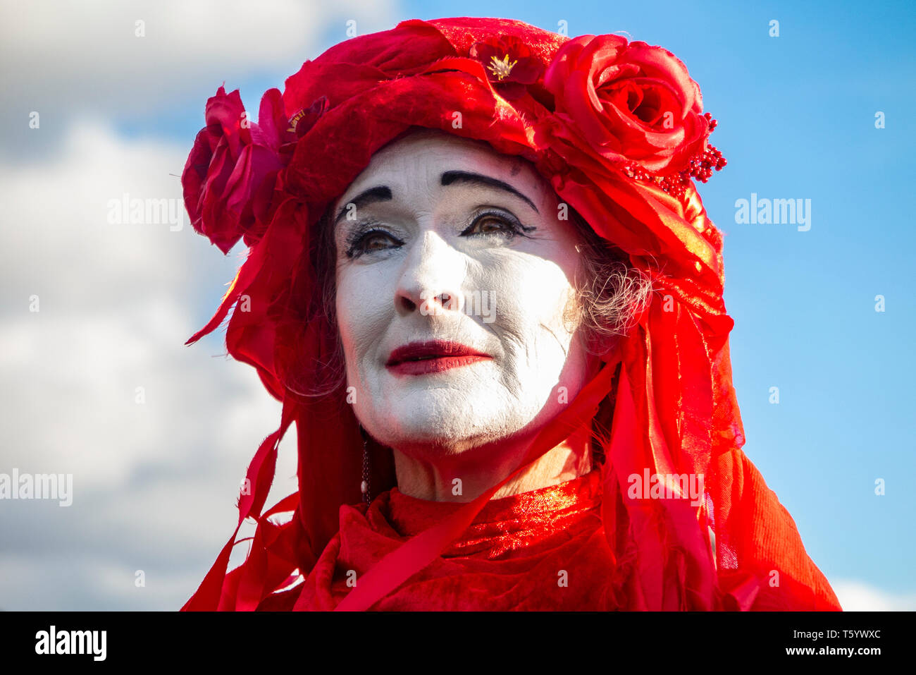 Red brigade environmental activists dressed as blood tears representing ...