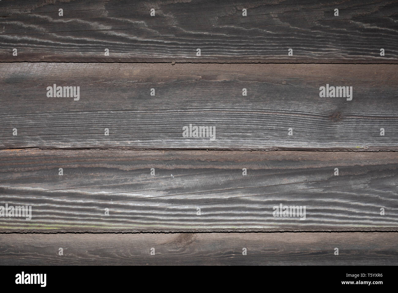 Exterior view of weathered, unpainted barn board. Background or texture ...