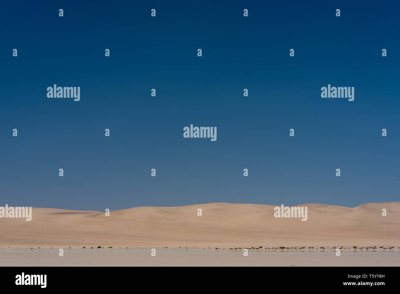 Coastal Sand Dunes under a large blue sky near Walvis Bay, Namibia ...