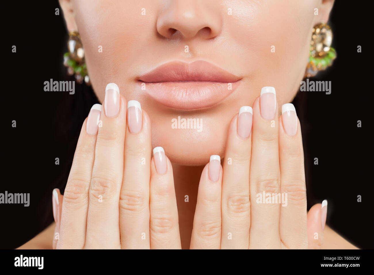 Perfect female hands with manicured nails and lips. French manicure and ...