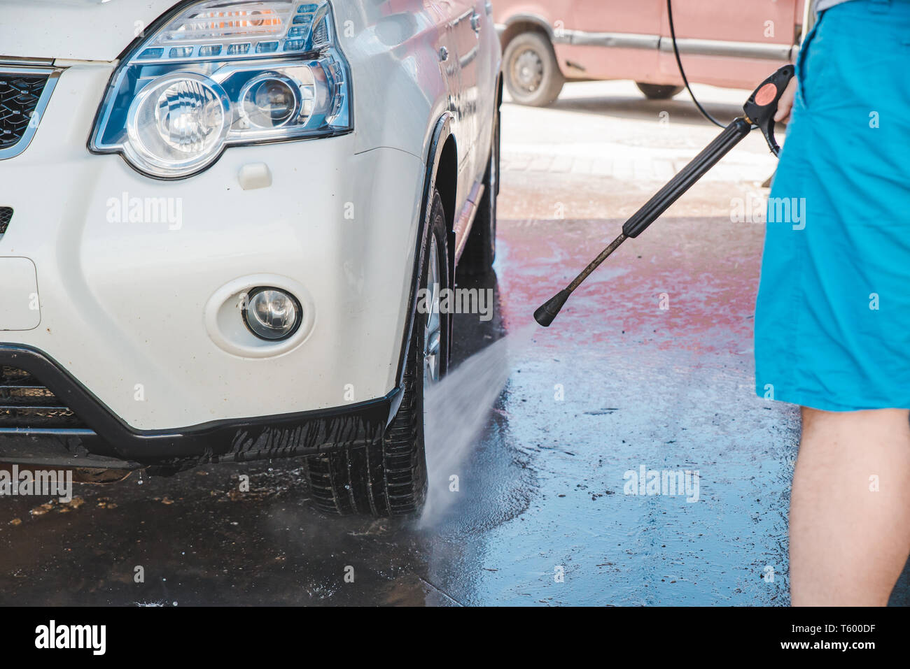 car wash concept. vehicle in soap. cleaning Stock Photo - Alamy