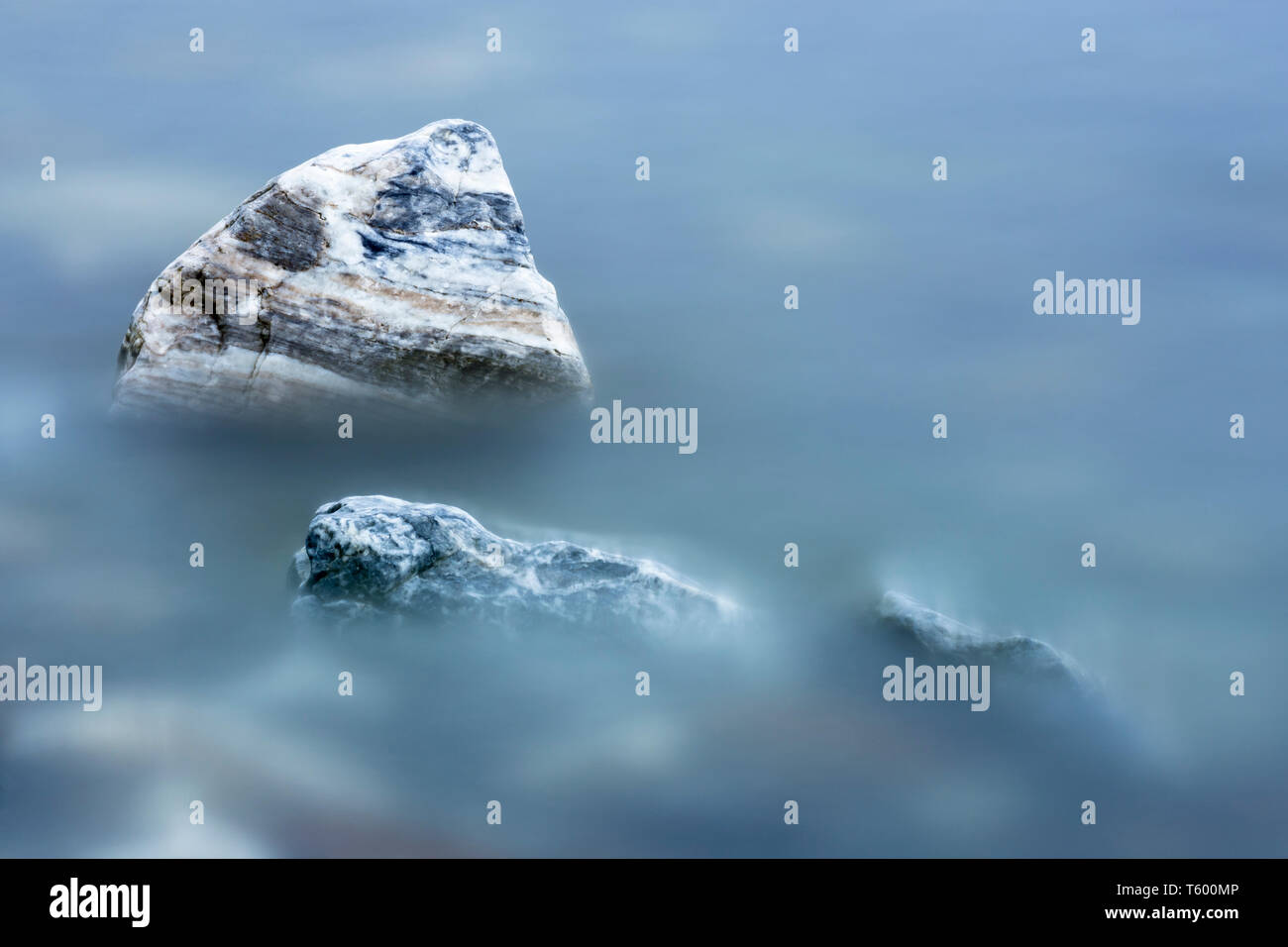 rocks in water Stock Photo - Alamy