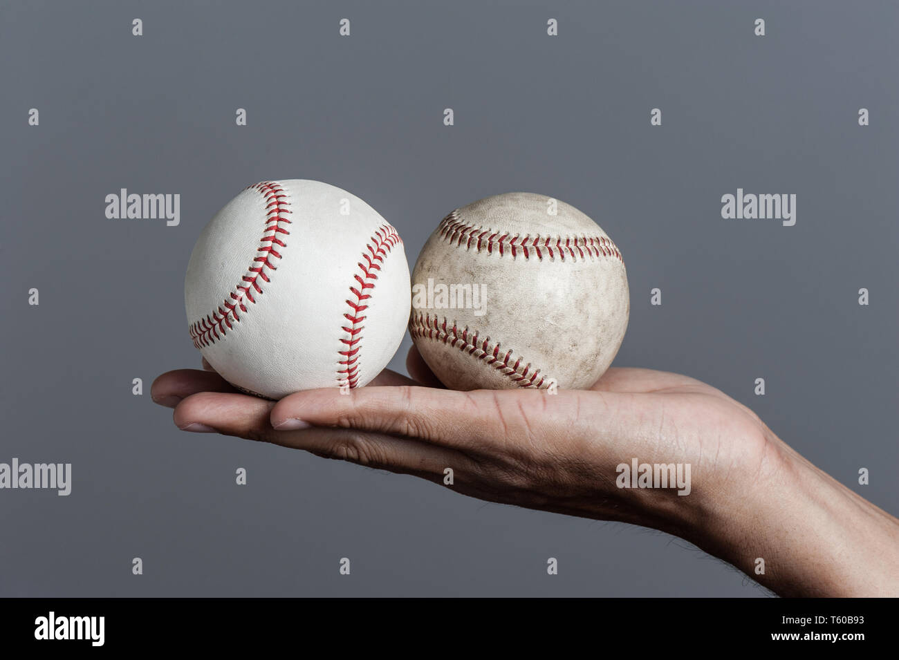 closeup baseball in man's hand, isolated over background Stock Photo ...