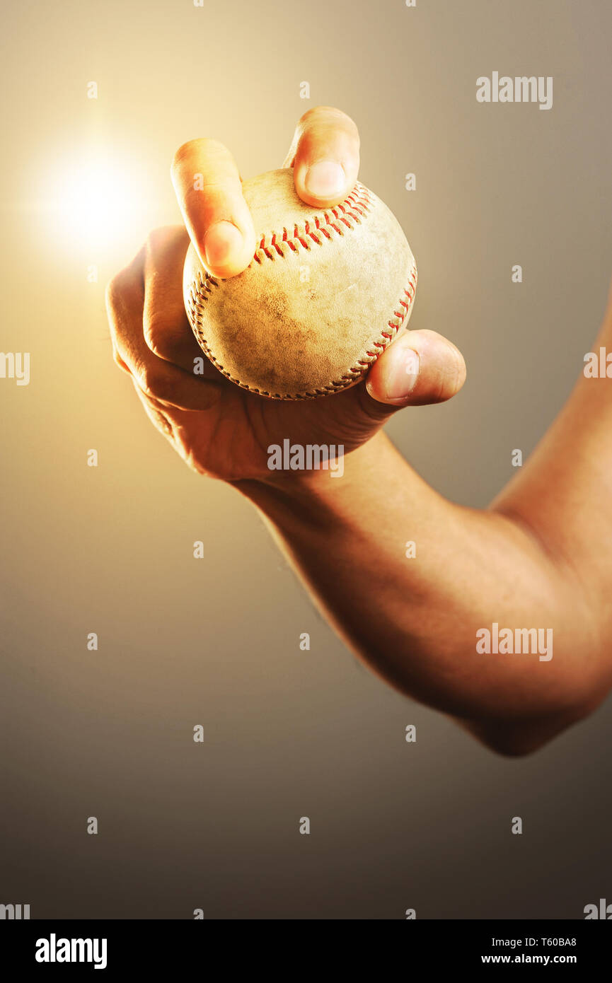 closeup baseball in man's hand, isolated over background Stock Photo ...