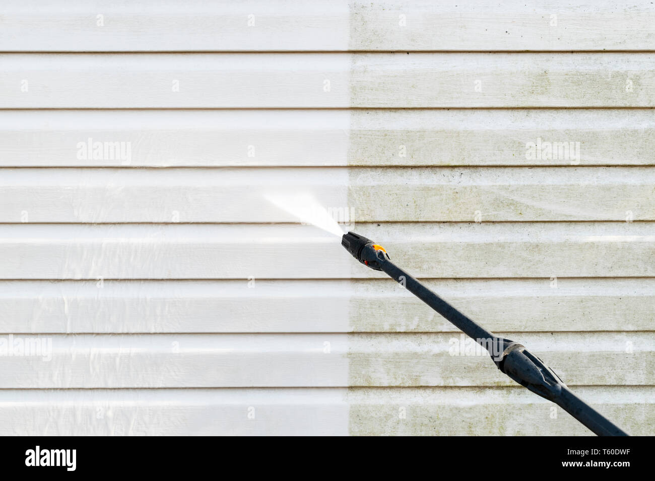 Cleaning service washing building facade with pressure water. Cleaning ...