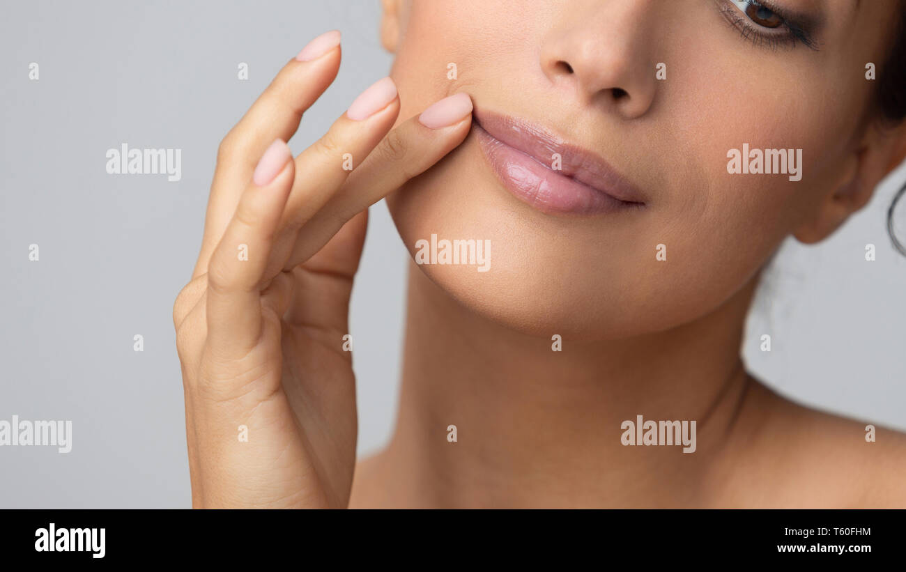 Hand near lips hi-res stock photography and images - Alamy