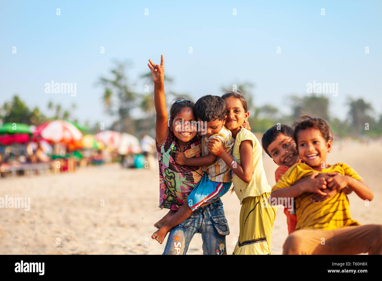 Indian family goa beach playing hi-res stock photography and images - Alamy
