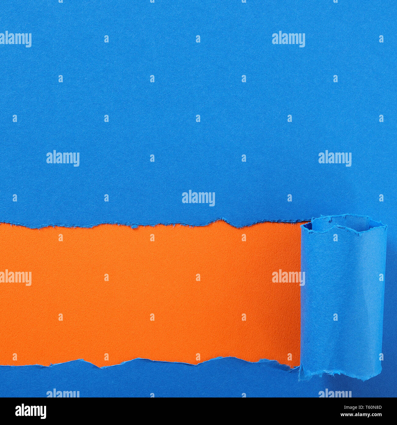 Torn blue paper strip orange background Stock Photo - Alamy