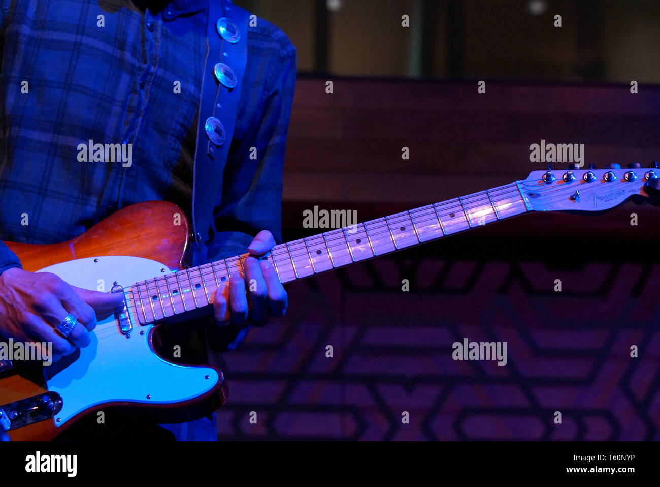 Playing a fender guitar hi-res stock photography and images - Alamy