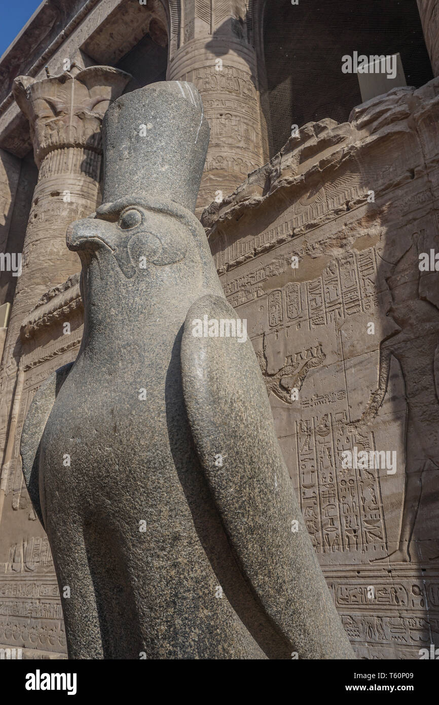 Edfu, Egypt: Statue of Horus at the temple of Edfu, the the largest ...
