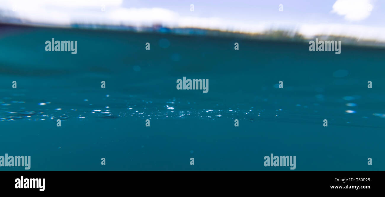 Blue Water Surface and Sky, Lake Underwater Split Photo, Above and ...