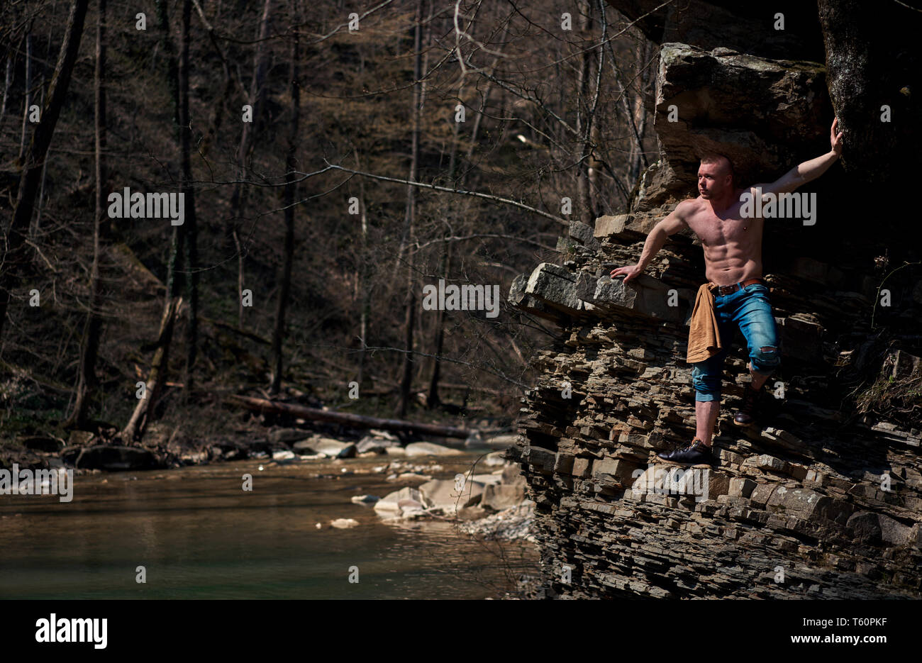 strong man climbs the mountain Stock Photo - Alamy