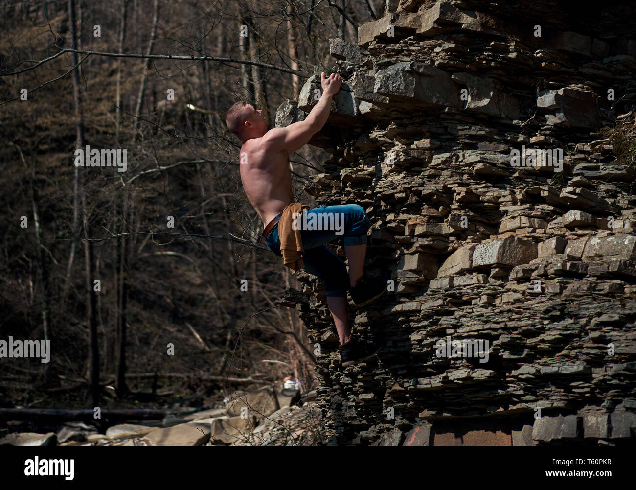 strong man climbs the mountain Stock Photo - Alamy