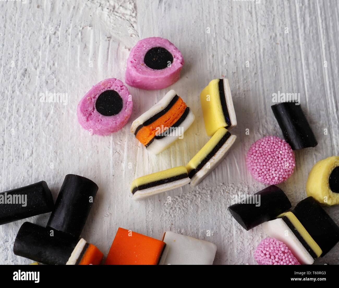 Black pieces liquorice candy background hi-res stock photography and ...
