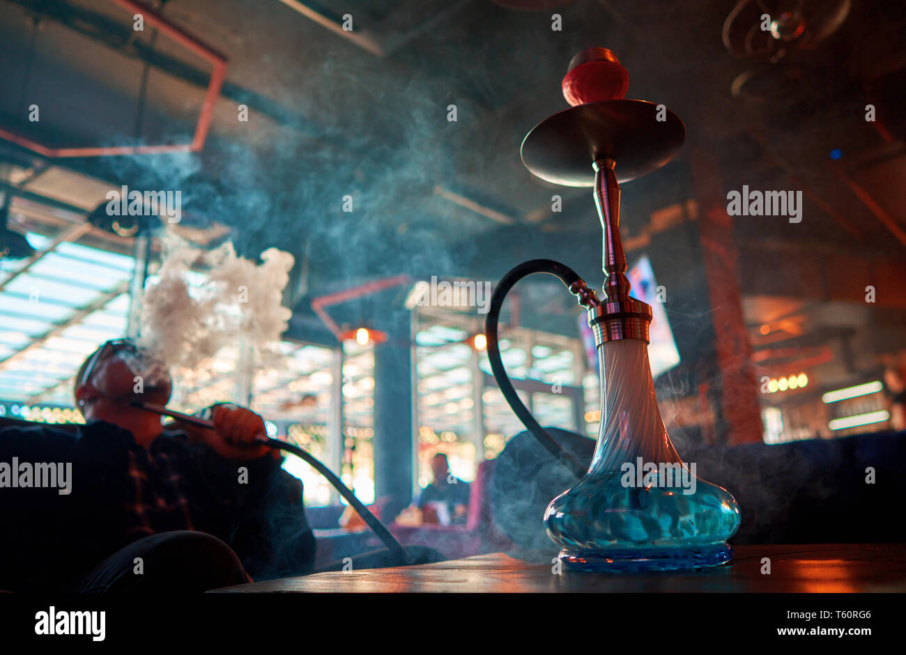 Middle eastern shisha pipe smoking hi-res stock photography and images ...