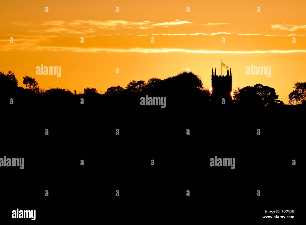 The sun rising behind St Mary's Church in Swillington,West Yorkshire,UK ...