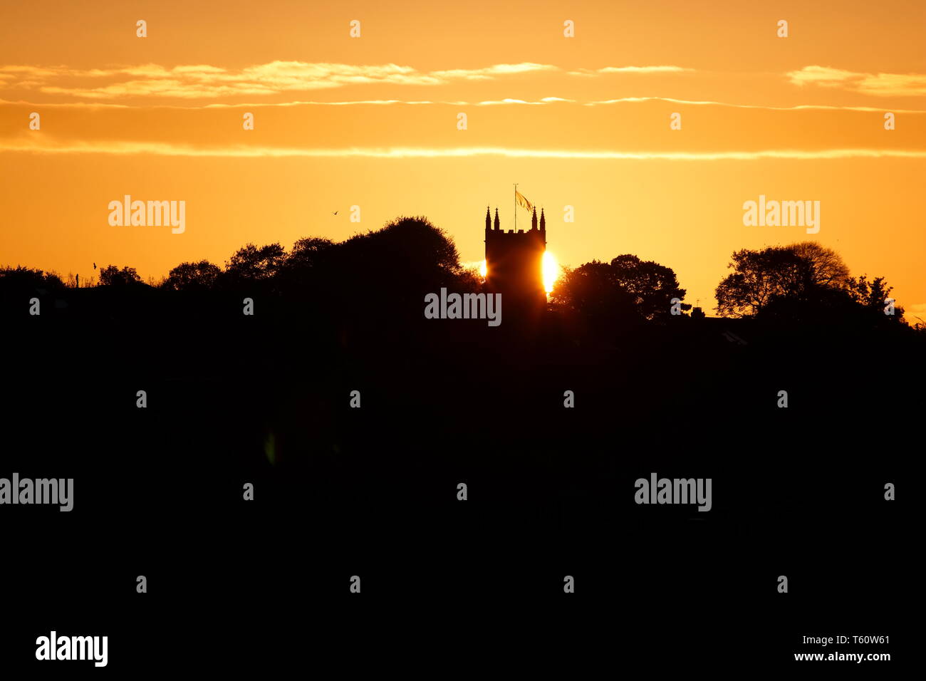 The sun rising behind St Mary's Church in Swillington,West Yorkshire,UK ...