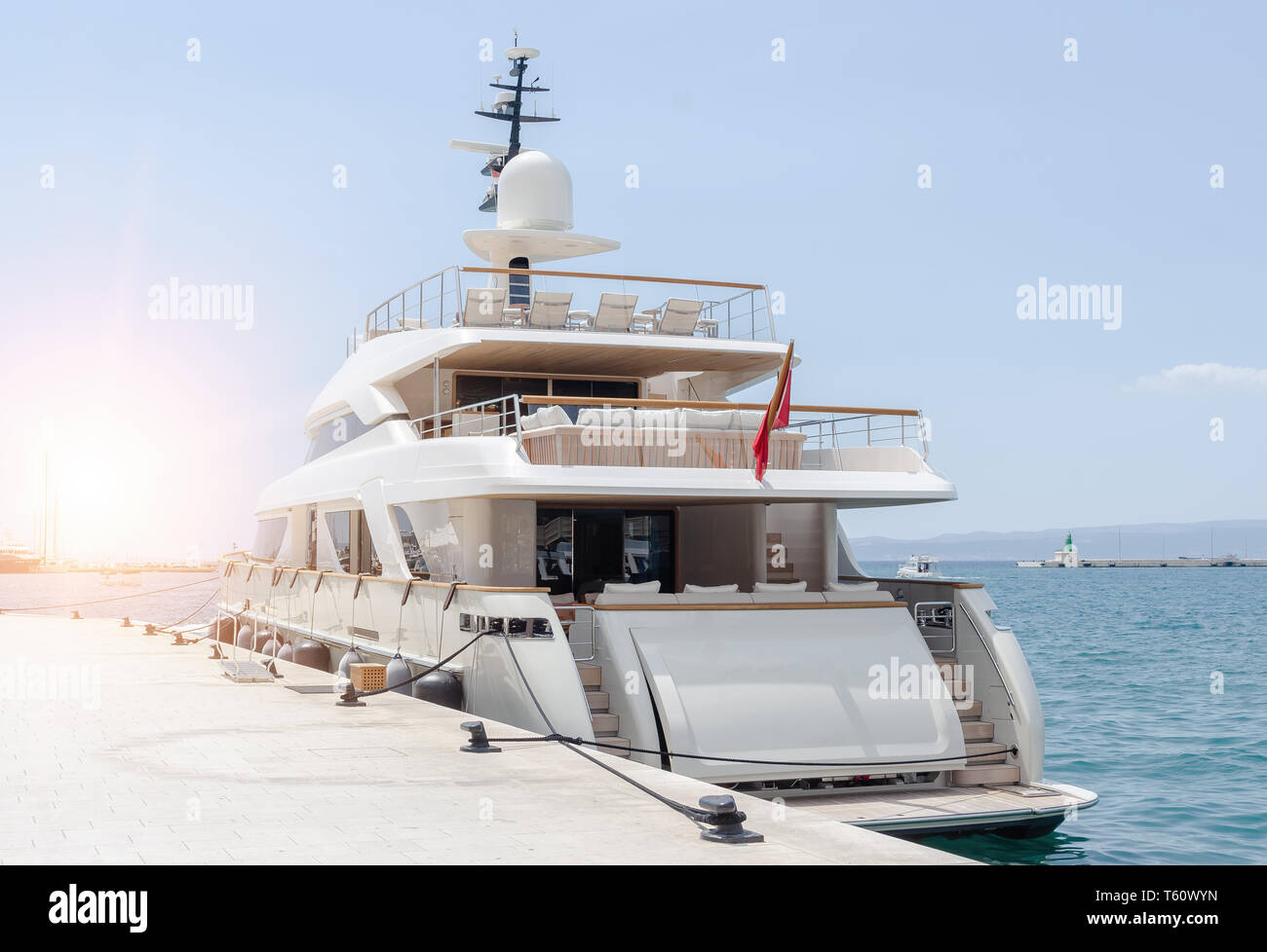 Luxury yacht parked at dock Stock Photo - Alamy
