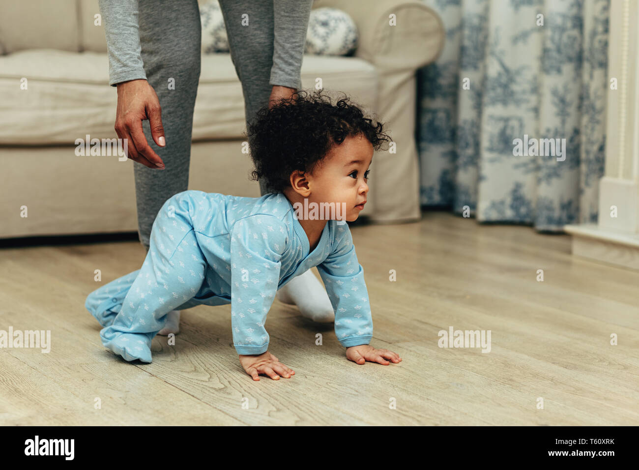 African baby crawling hi-res stock photography and images - Alamy