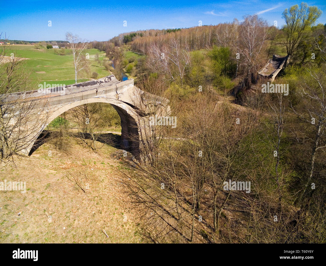 Destroyed railway bridge over Sapina river, Kruklanki town in the ...