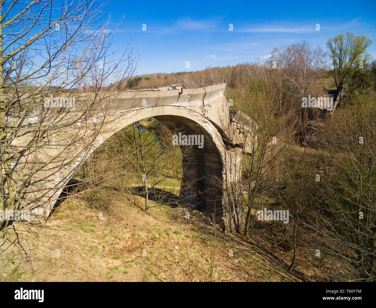 Destroyed railway bridge over Sapina river, Kruklanki town in the ...
