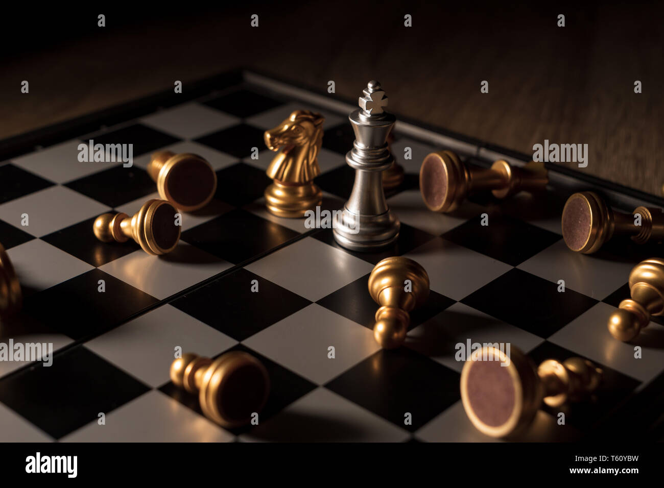 Close up shot chess on the board game with dark mood and tone process ...