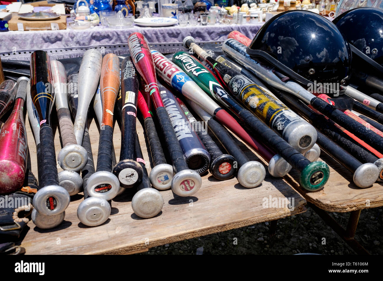Baseball bats on sale at a flea market Stock Photo - Alamy