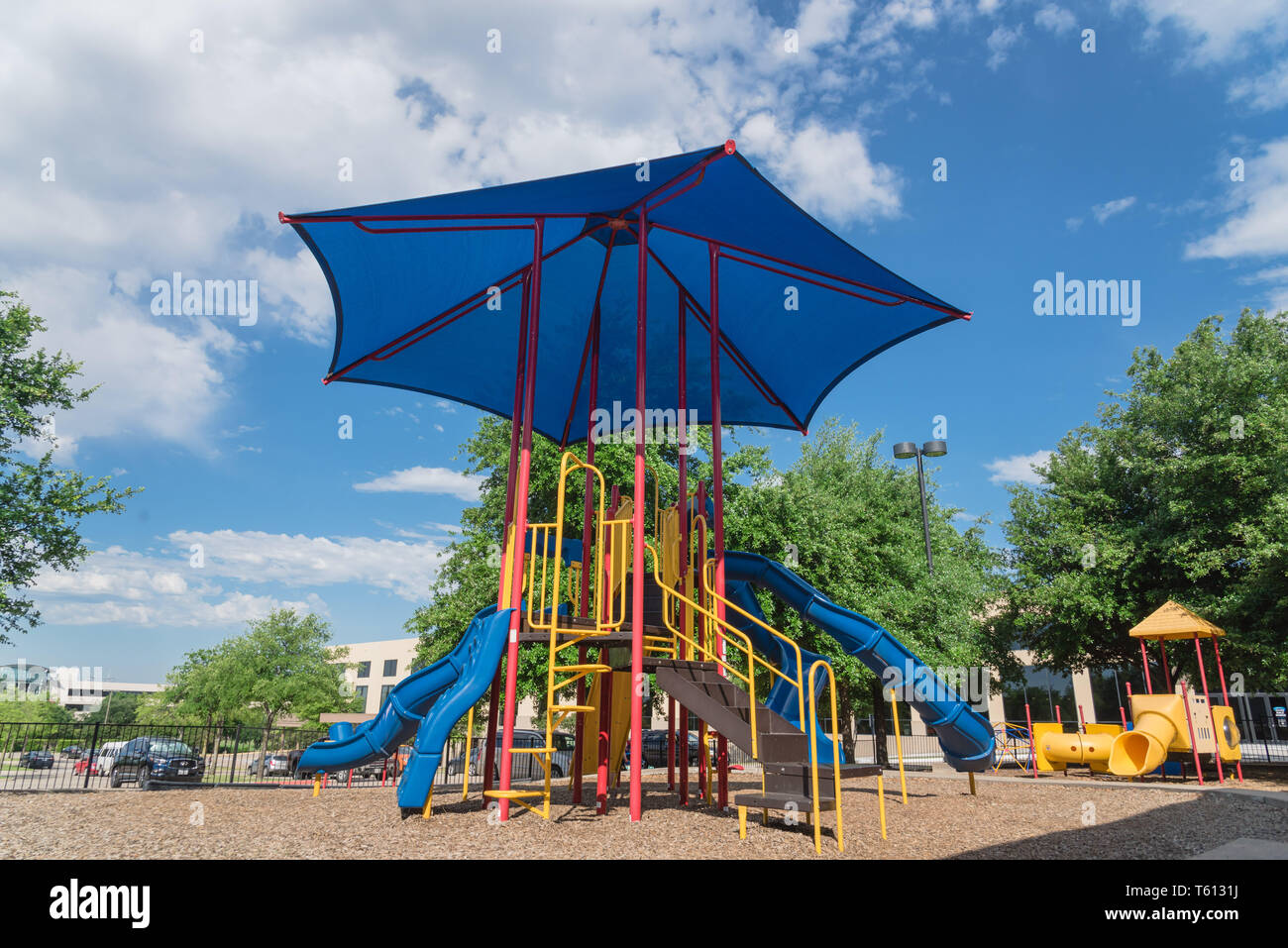 Neighborhood playground with colorful structure equipment near Dallas ...