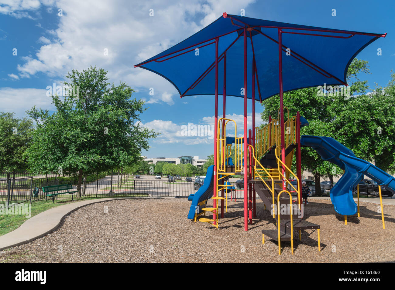 Neighborhood playground with colorful structure equipment near Dallas ...