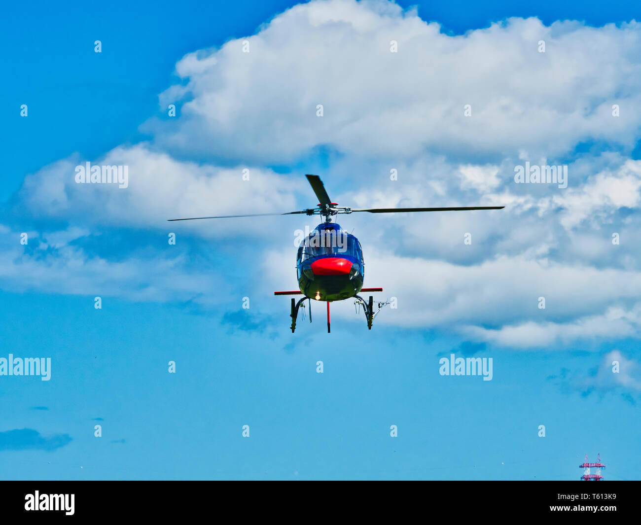 Flying helicopter airplane in blue sky with clouds. outdoors Stock ...