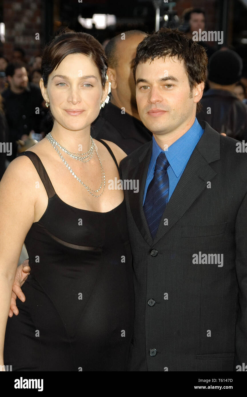 Carrie-Anne Moss & Steven Roy at the Los Angeles Premiere of Warner ...