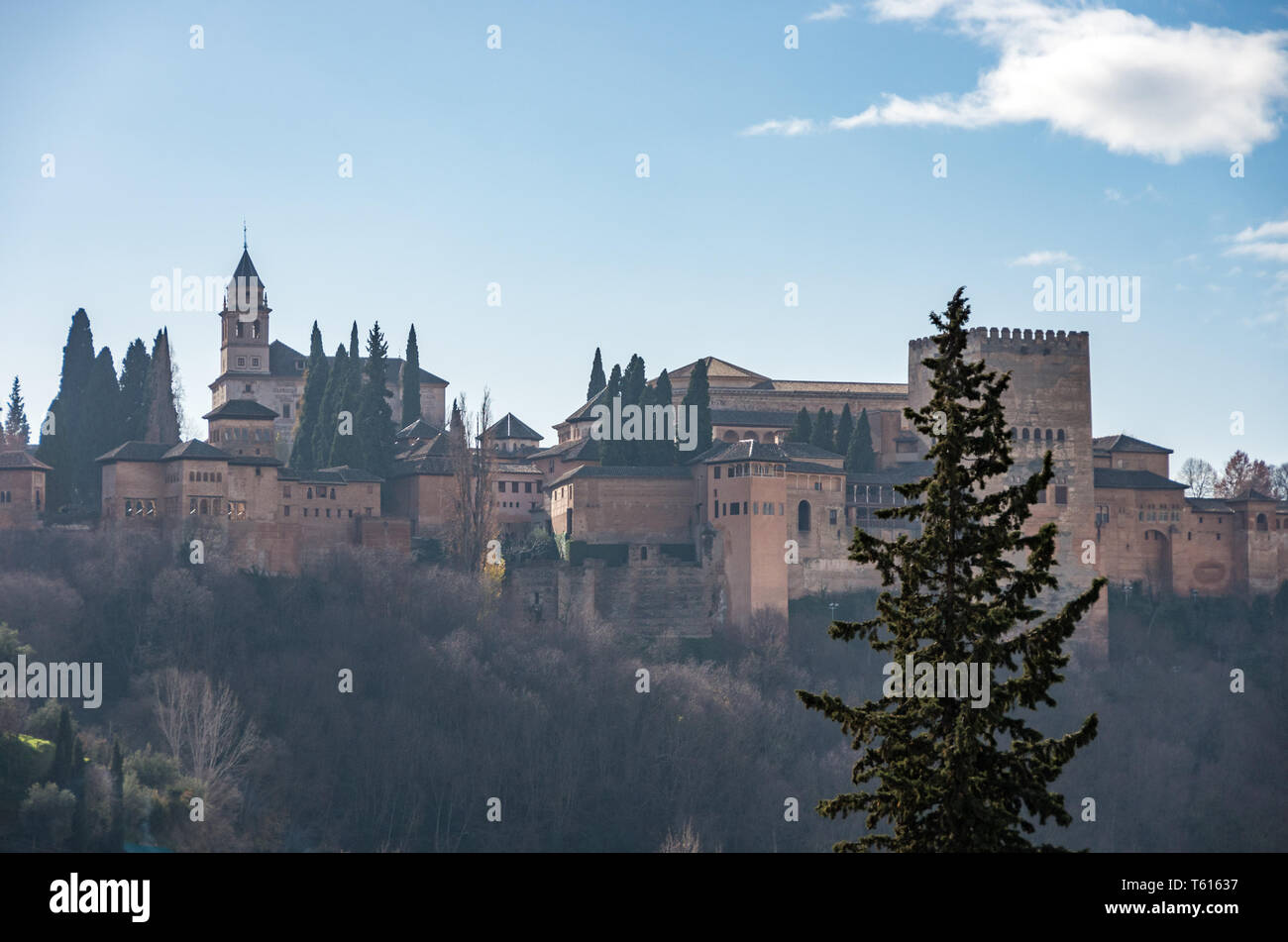 View of Alhambra Palace in Granada, Spain with Sierra Nevada mountains ...