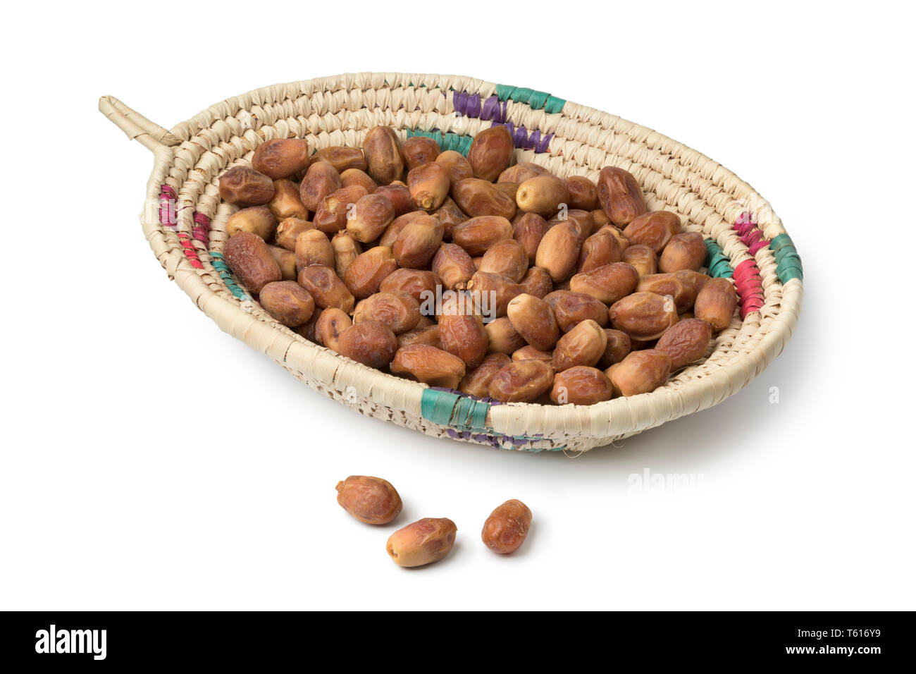 Basket with dried Iranian Zahedi dates isolated on white background ...