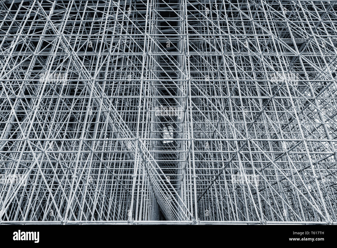Vertical scaffolding formed a myriad of grid. Industrial and modern ...