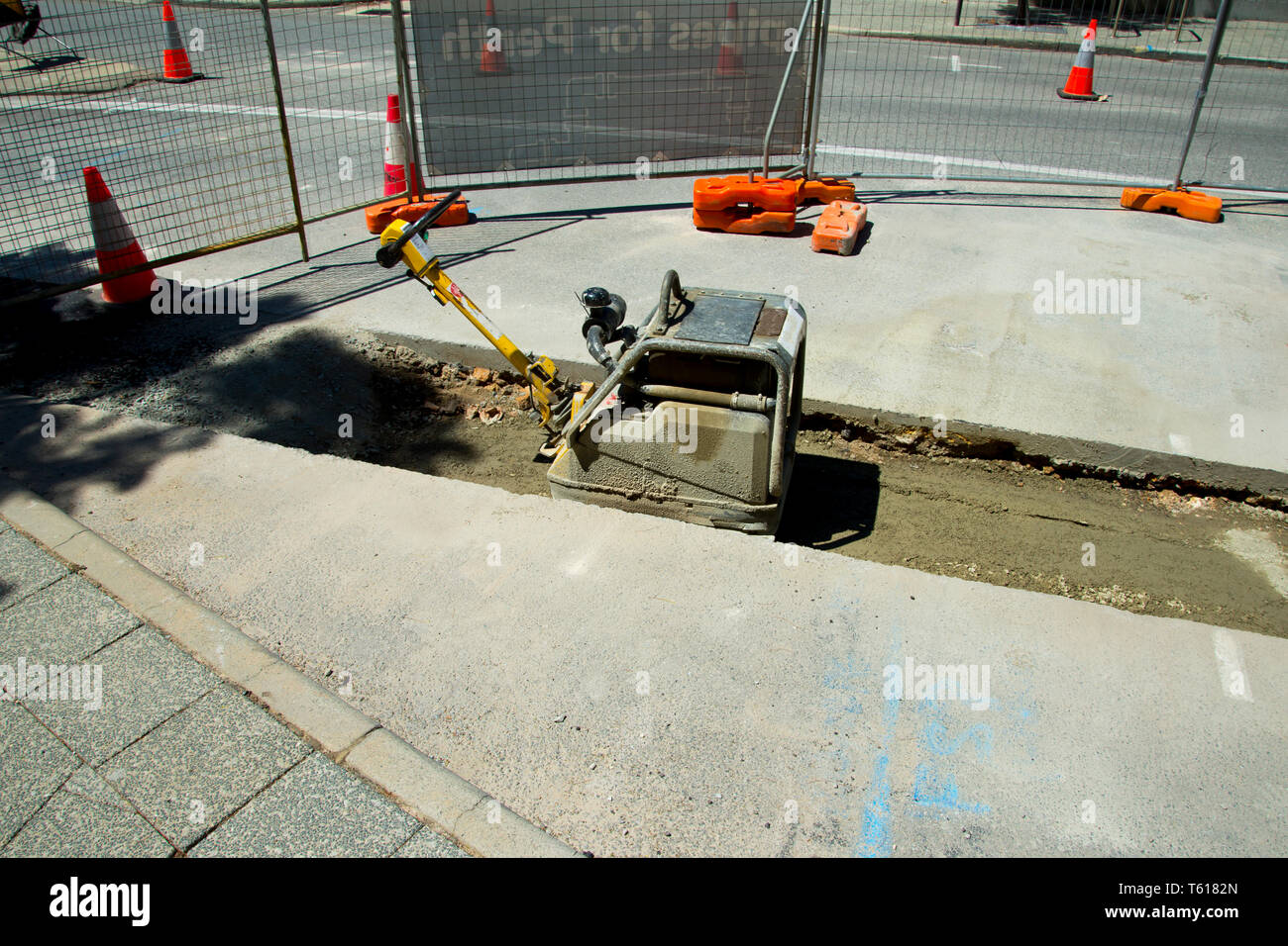 Industrial Vibratory Plate in Road Construction Stock Photo - Alamy