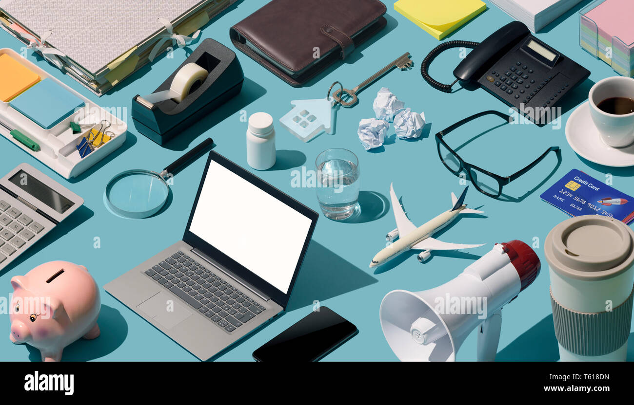 Messy cluttered business desktop with assorted isometric objects ...