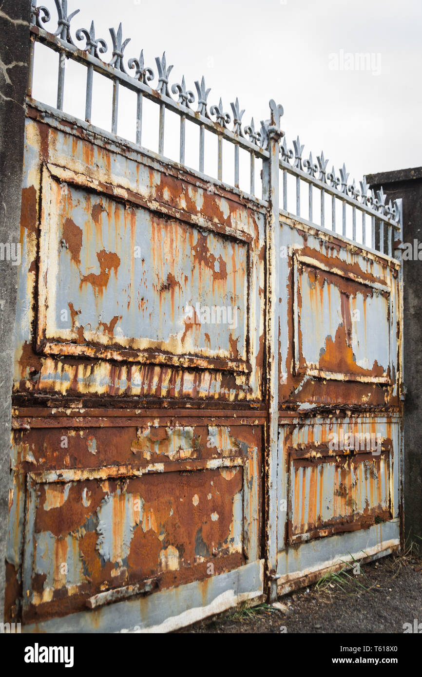 Rusty House Blue Portal in the street Stock Photo - Alamy