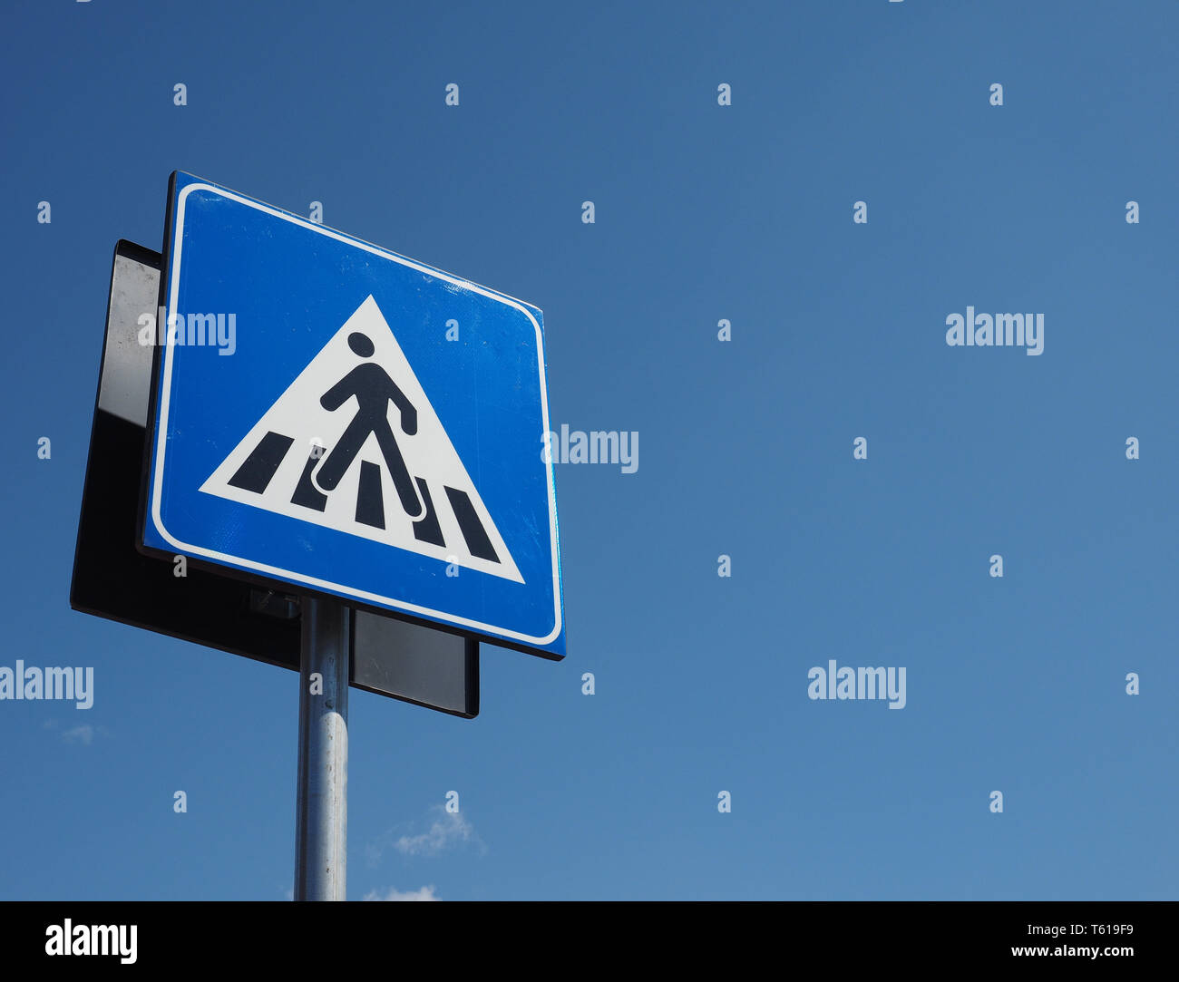 Warning signs, zebra crossing traffic sign over blue sky Stock Photo ...