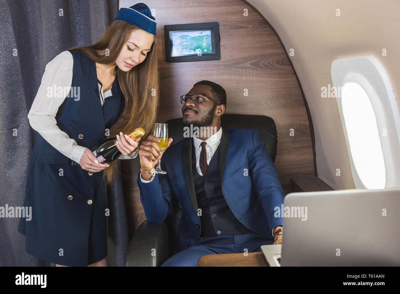 Stewardess working first class hi-res stock photography and images - Alamy
