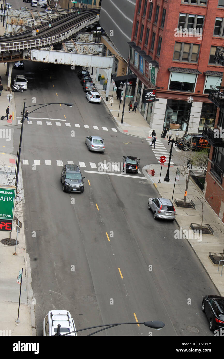 A street intersection below the Chicago CTA L elevated train downtown ...