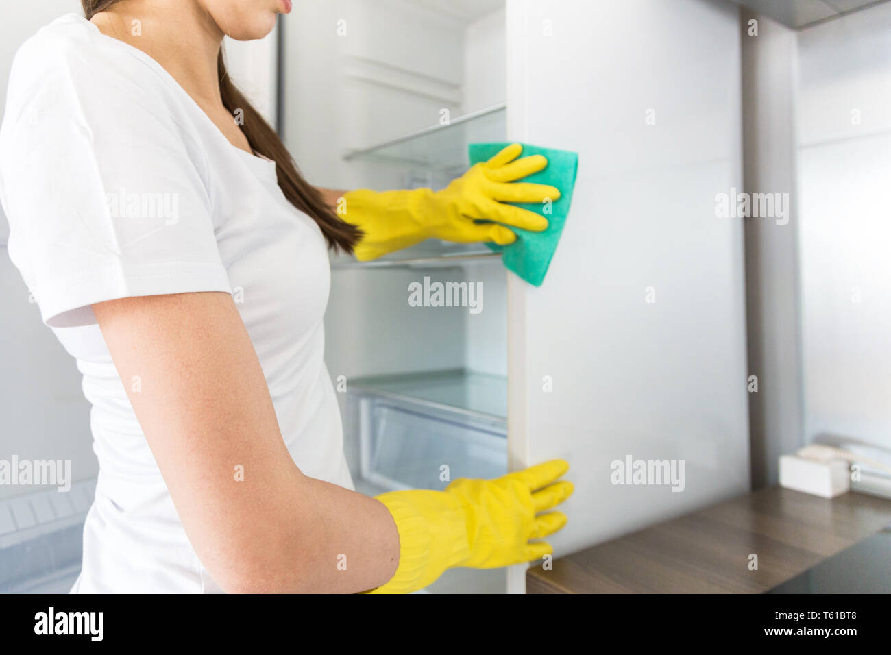 Woman cleaning fridge hi-res stock photography and images - Alamy