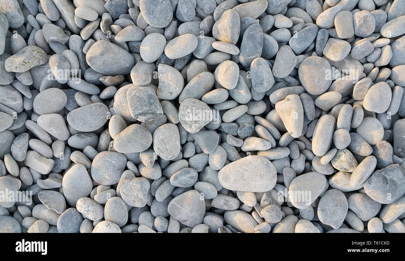 Nature background from gray sea pebbles Stock Photo - Alamy