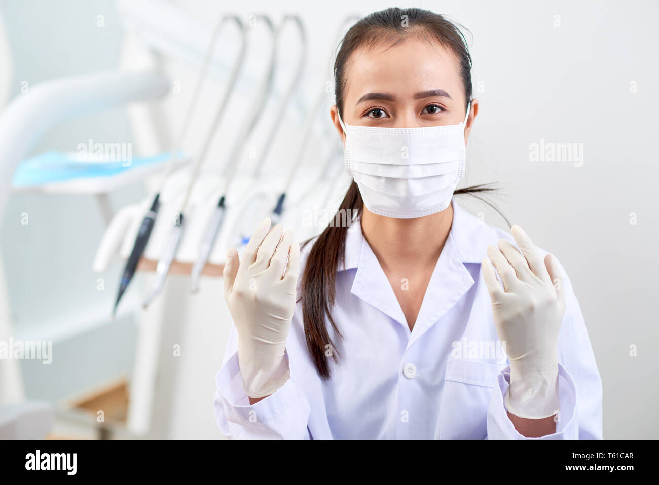 Dentist ready for check-up Stock Photo - Alamy