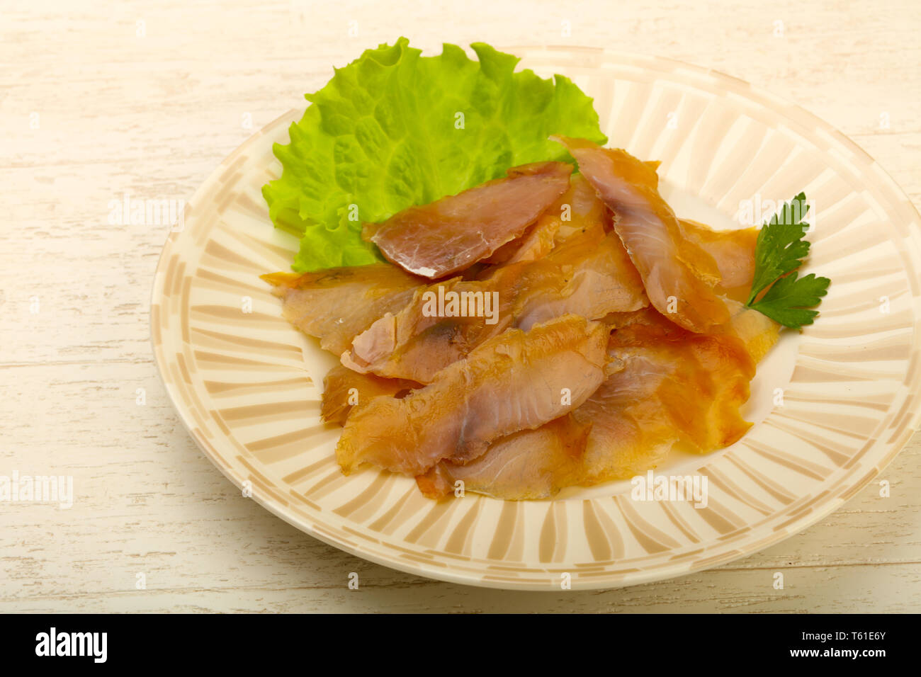 Smoked catfish fillet carpaccio Stock Photo - Alamy