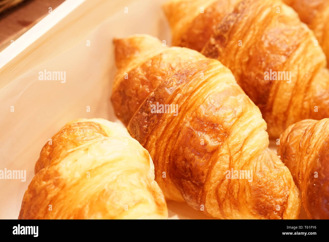 fresh croissant in the basket, ready to serve Stock Photo - Alamy